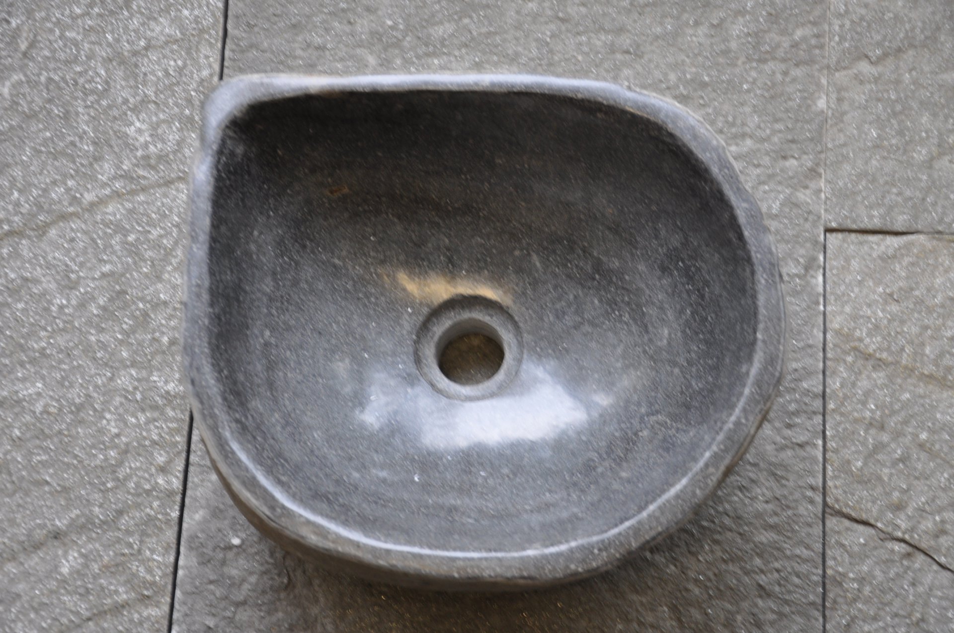 Basin from basalt boulder