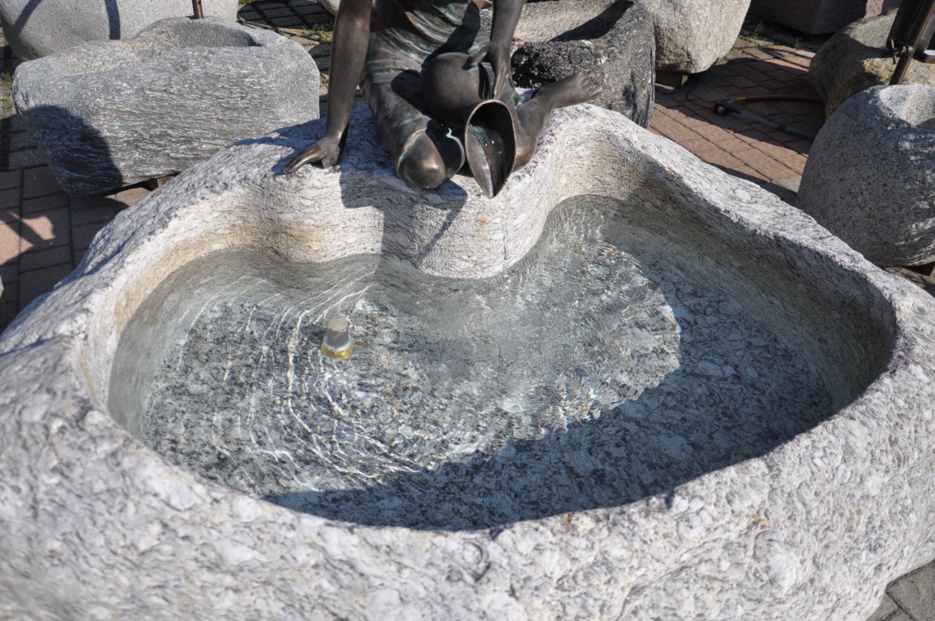 Tonalite fountain with bronze figure Elonie