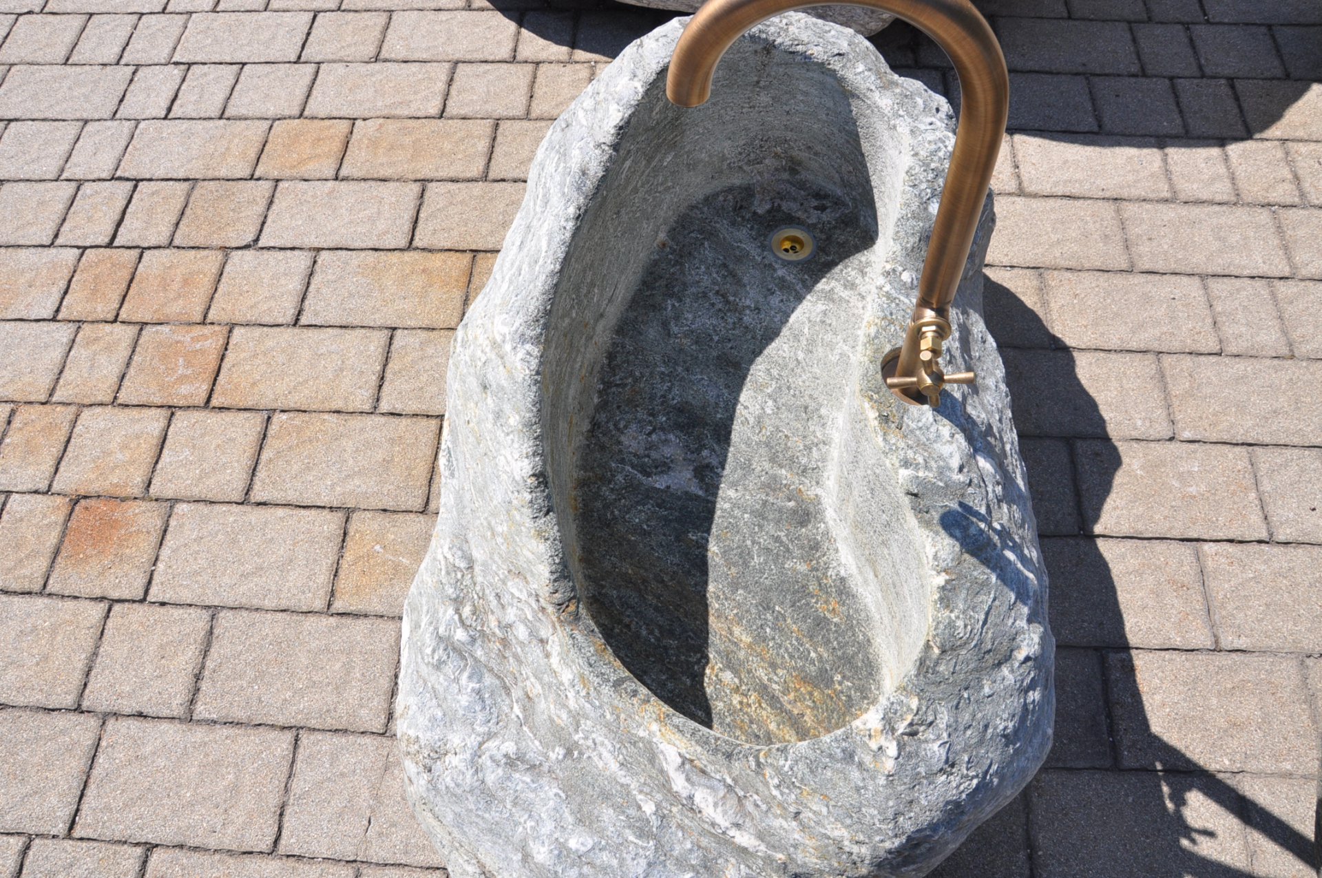 Fountain boulder in quartz phyllite from Eisacktal